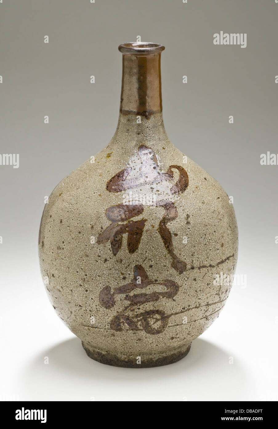 A sake bottle (tokkuri), a traditional Japanese vessel for serving sake ...