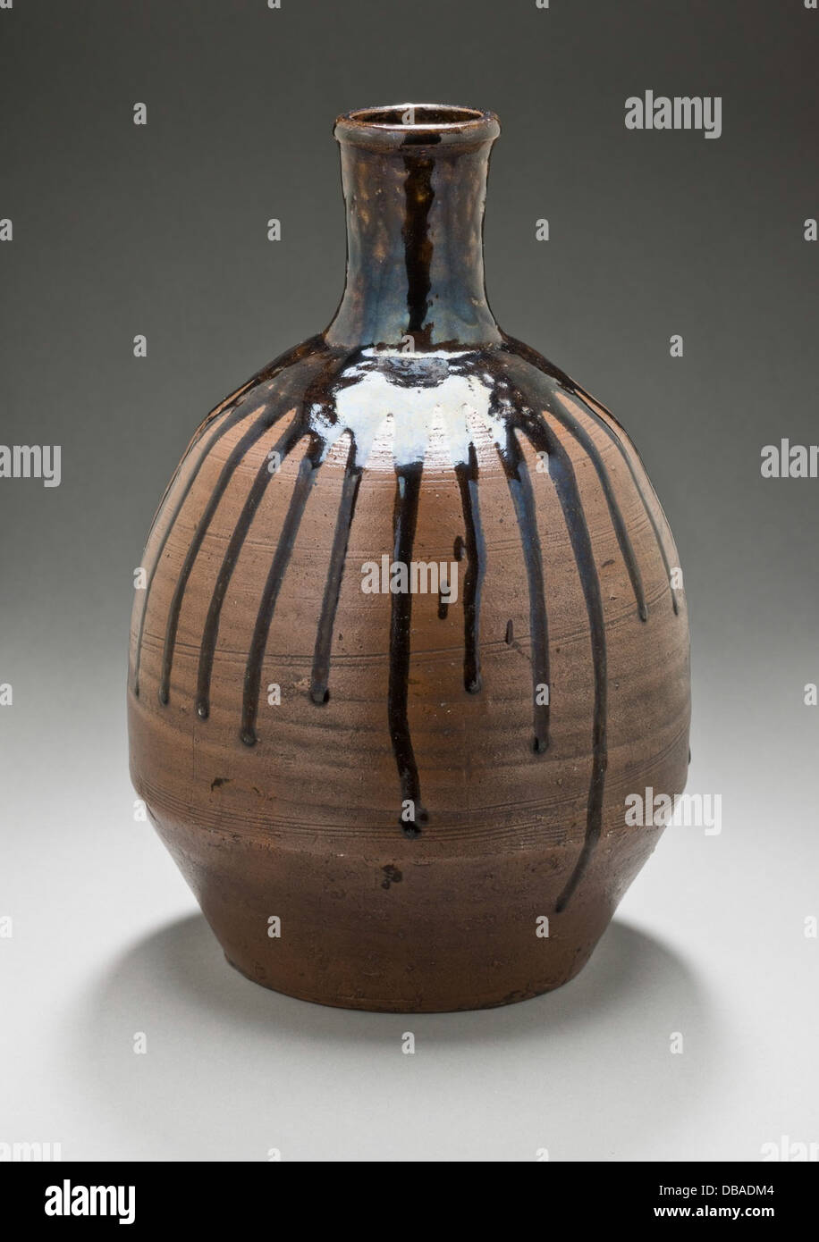 This sake bottle (tokkuri) from Japan features a traditional design ...
