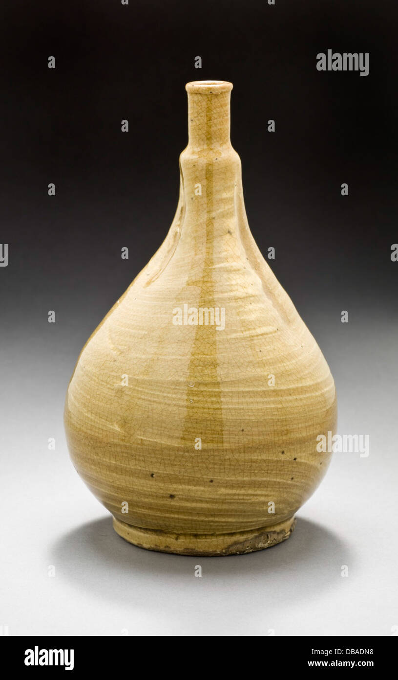 This tokkuri, a traditional Japanese sake bottle, is made of ceramic ...