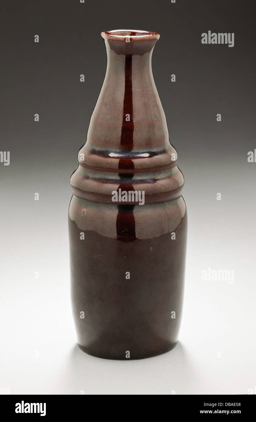 This tokkuri sake bottle, crafted in ceramic, reflects traditional ...