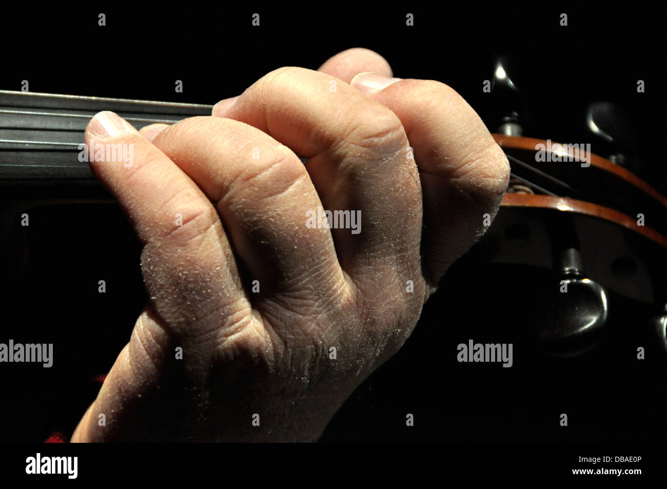 Close up musician playing violin hi-res stock photography and images ...