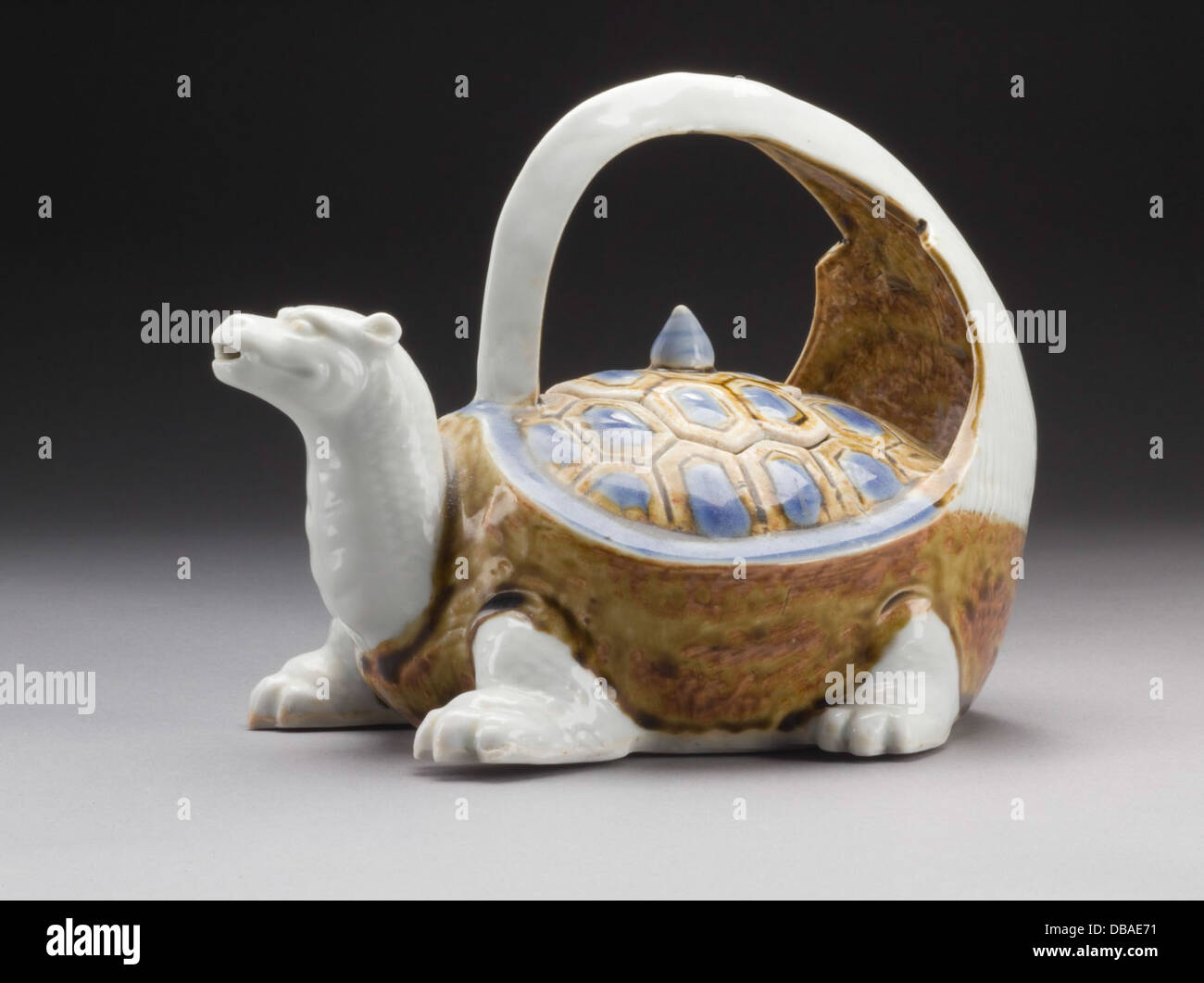 This sake flask, designed in the form of a long-tailed turtle, is a ...