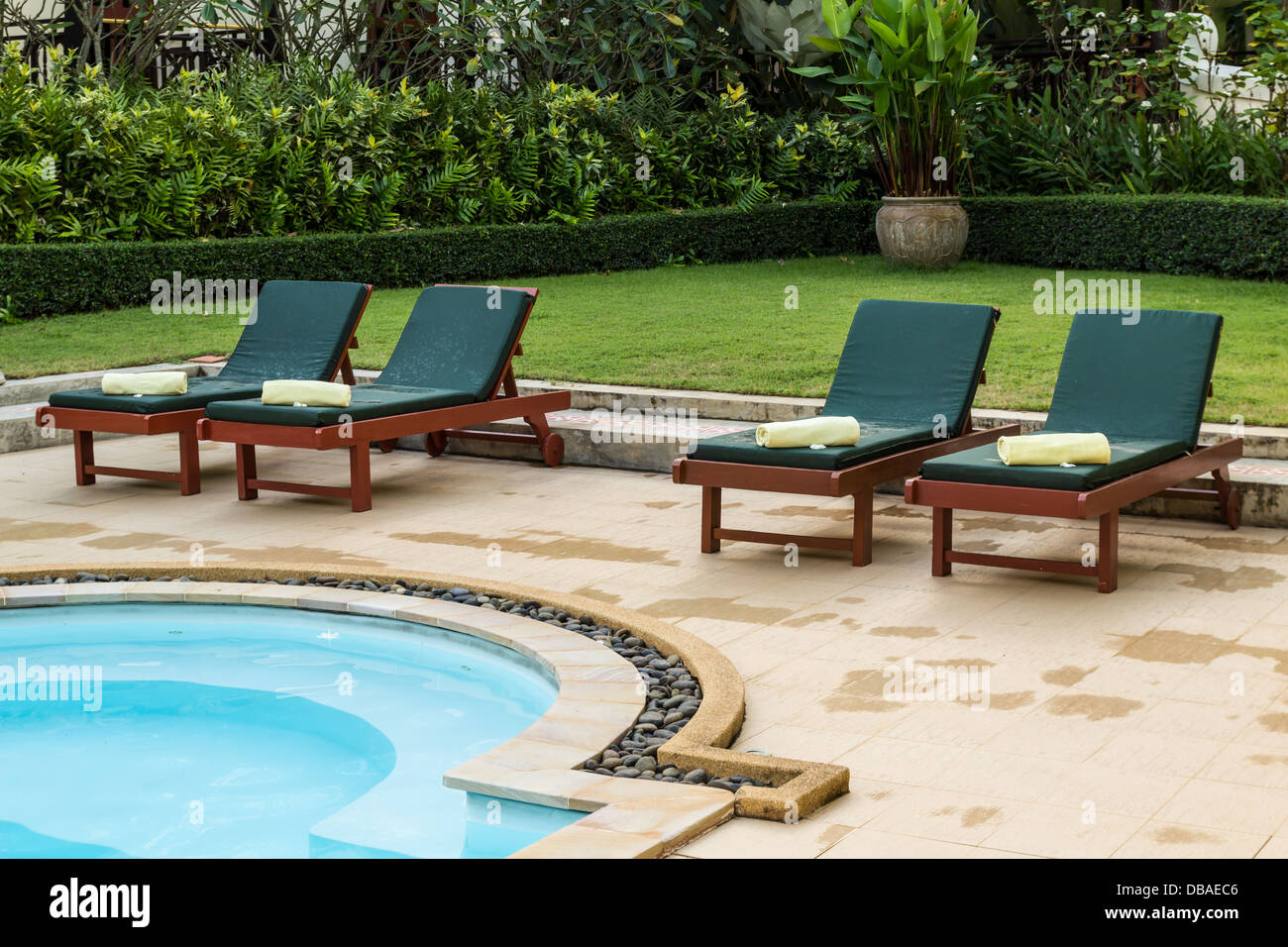 Bed in swimming pool in resort, Thailand Stock Photo - Alamy