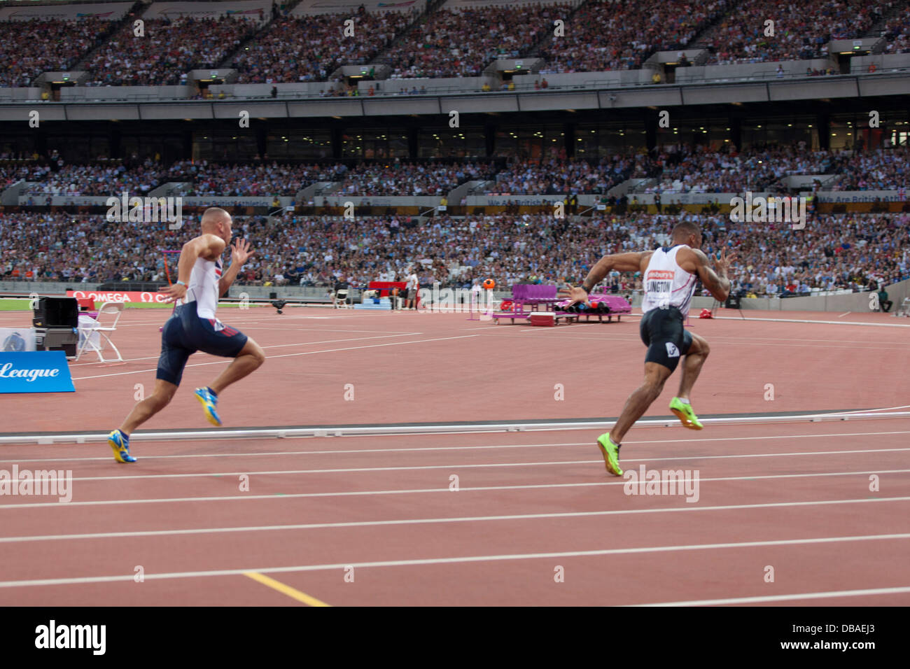 Athletes in action hi-res stock photography and images - Alamy