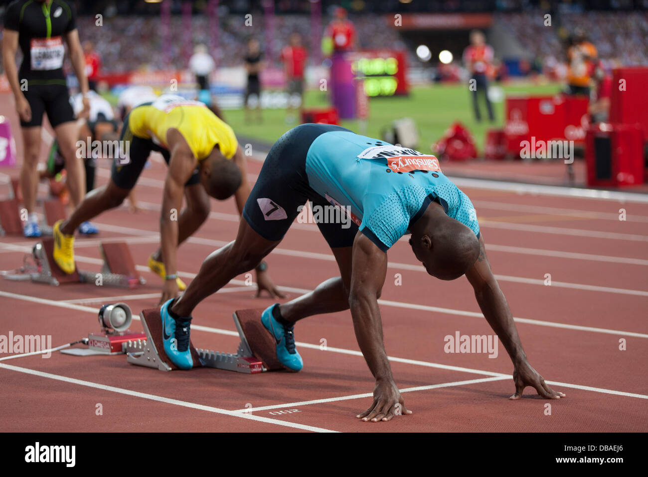 London, UK. 26th July, athletes set and in action at the 200m mens race ...