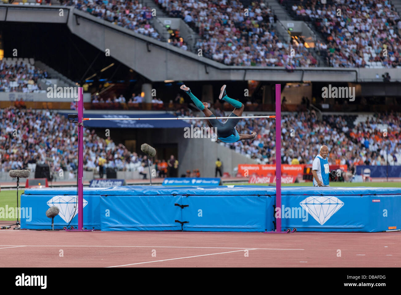 Jumping over the bar hi-res stock photography and images - Alamy