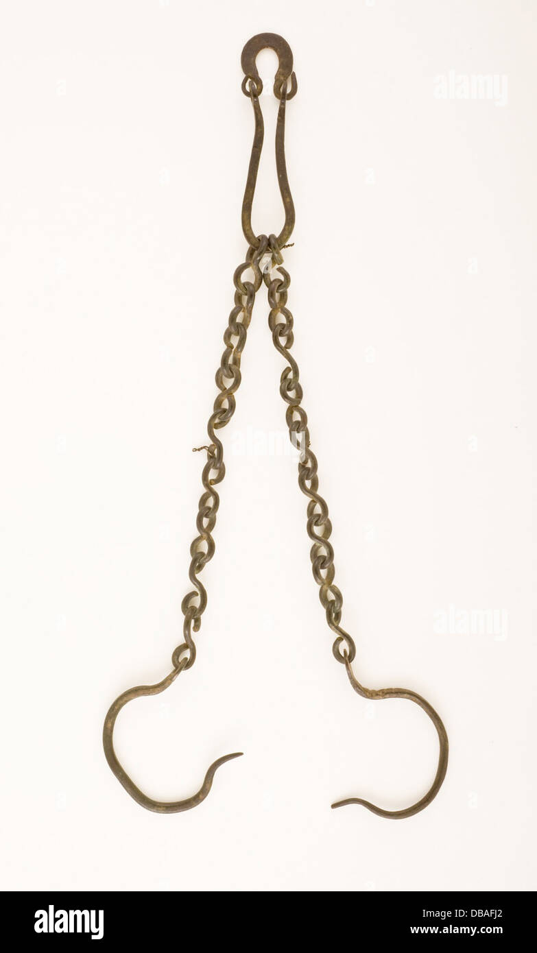 A small-scale artifact used for weighing items, crafted with precision ...