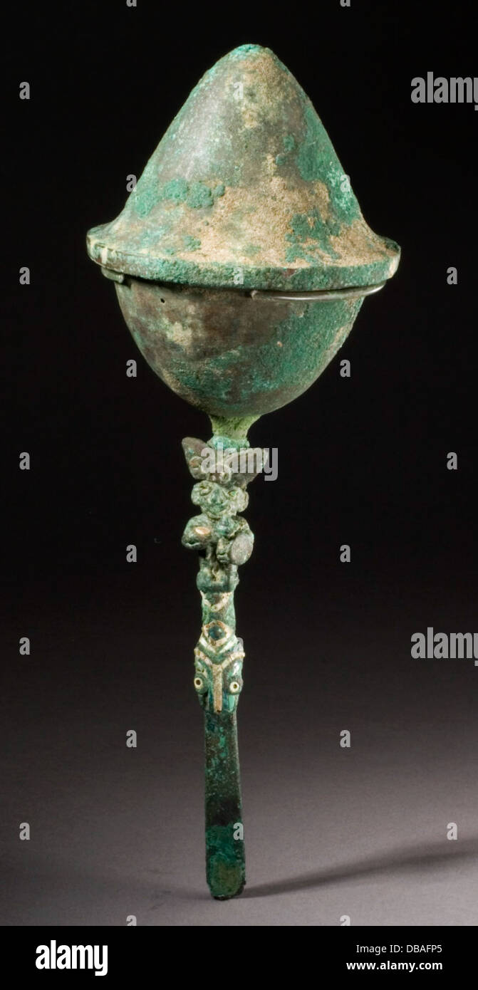 A scepter-rattle from the ancient world, featuring intricate bronze ...