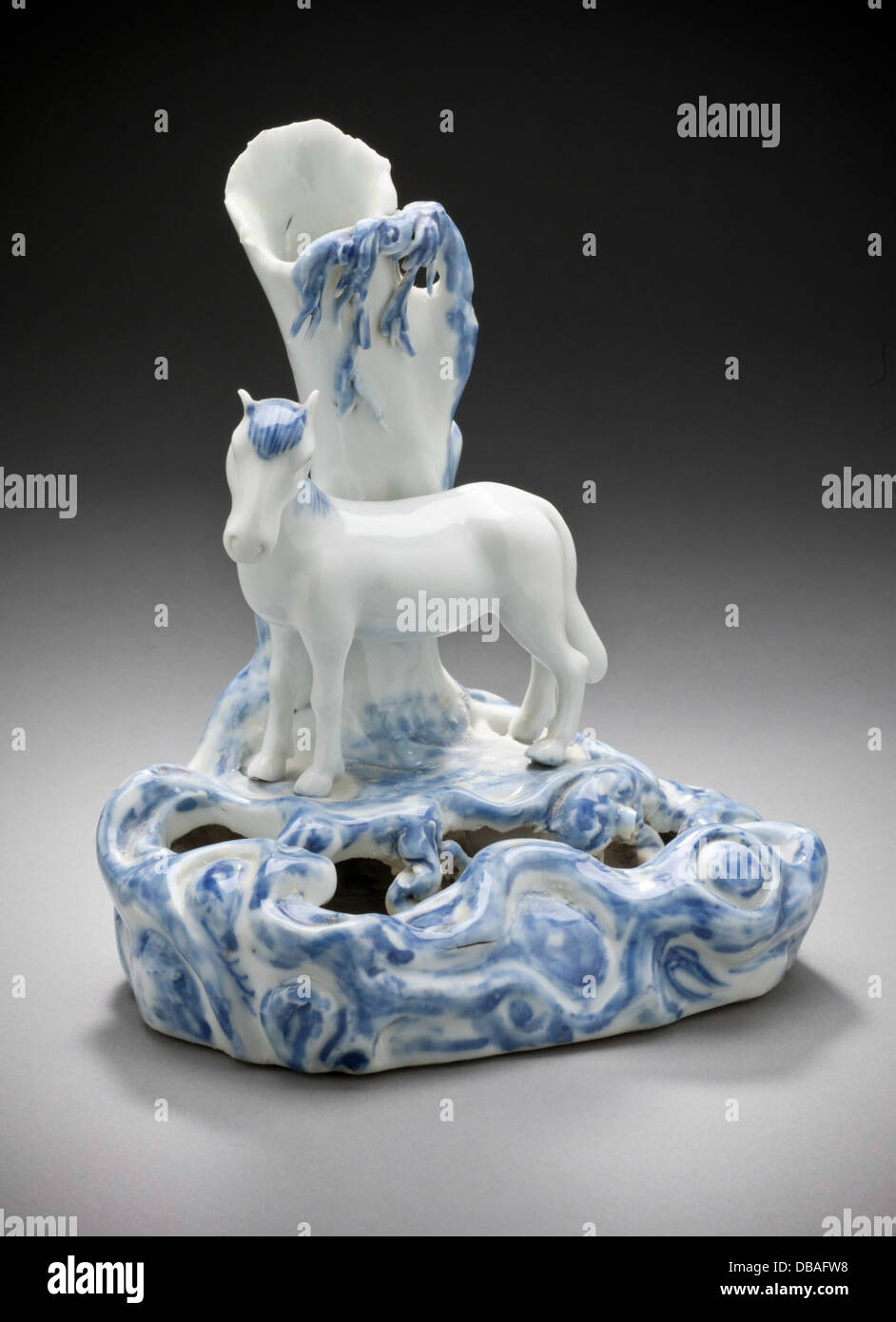 This sculpted vase combines artistic representation with functional ...