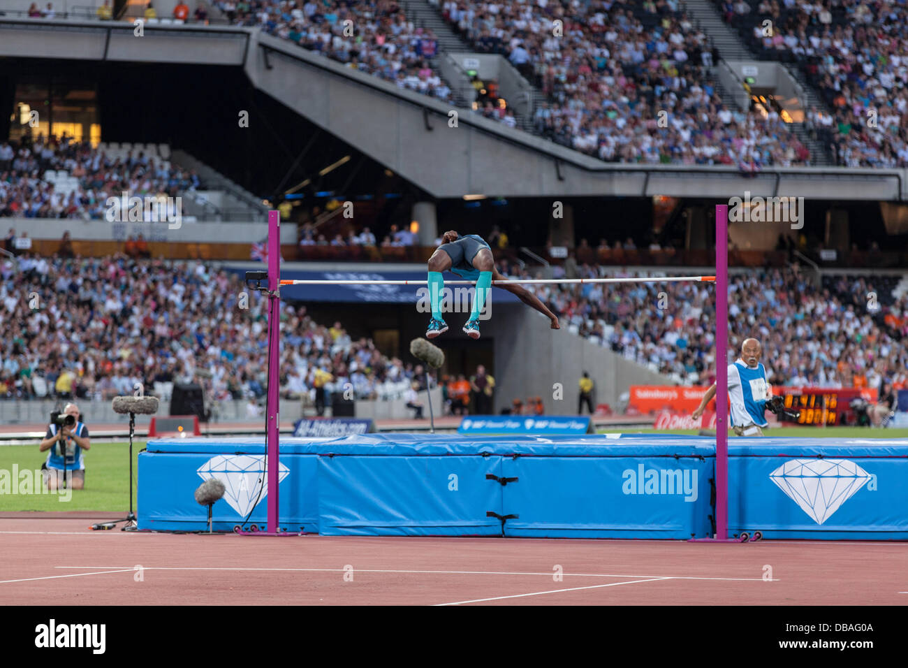 Jumping over the bar hi-res stock photography and images - Alamy