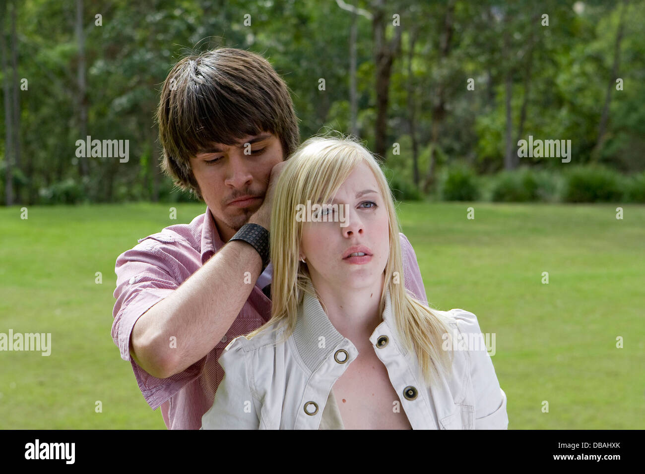 a domestic violence situation of a man attacking a woman Stock Photo ...