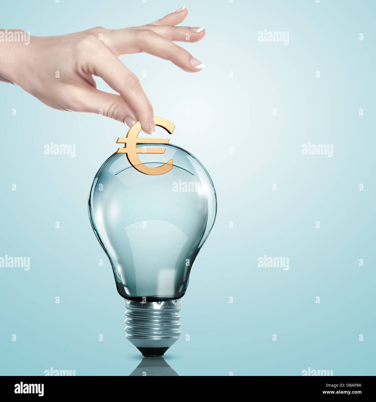 Money inside an electric light bulb Stock Photo - Alamy