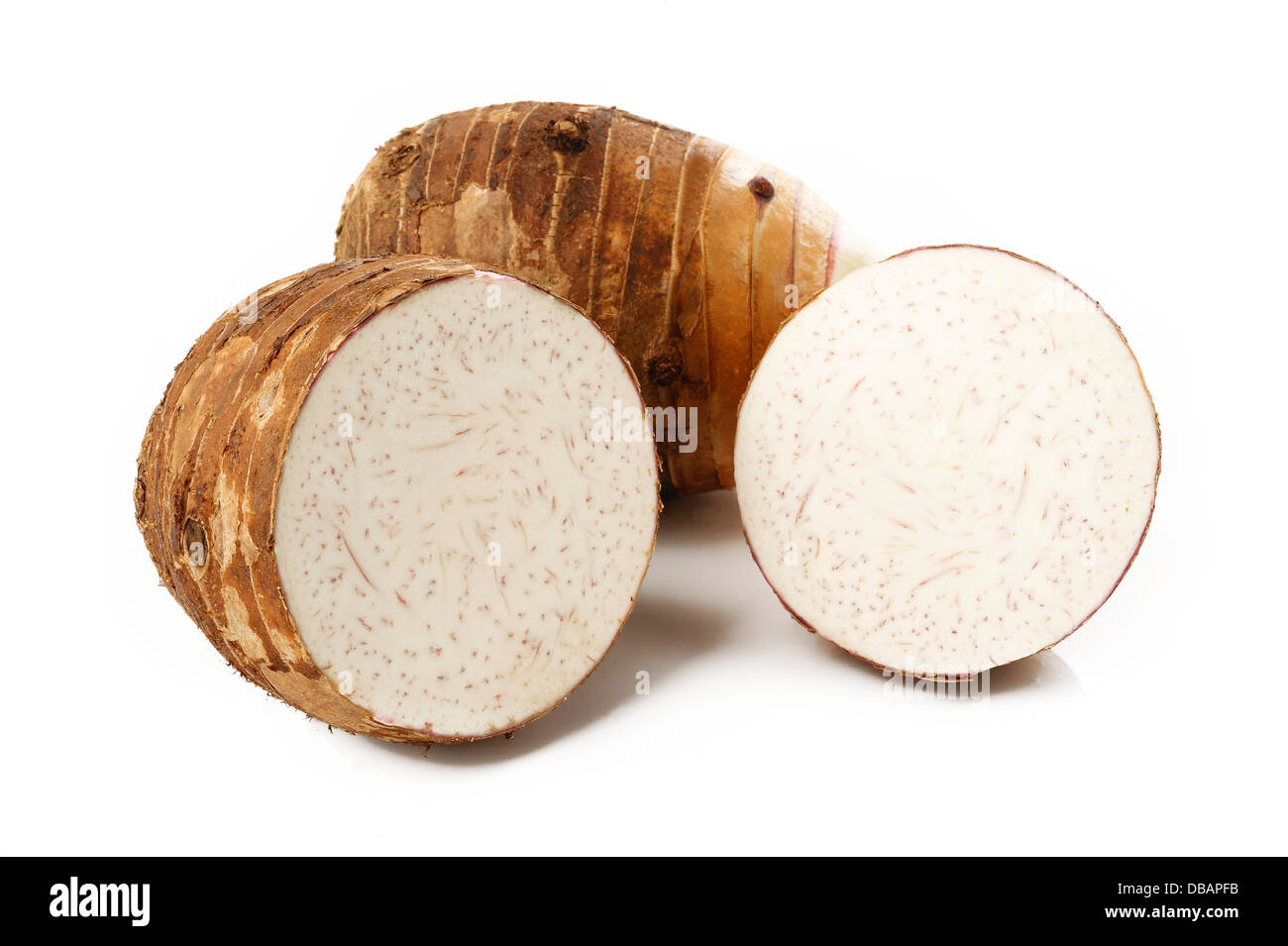 taro roots on white background Stock Photo - Alamy