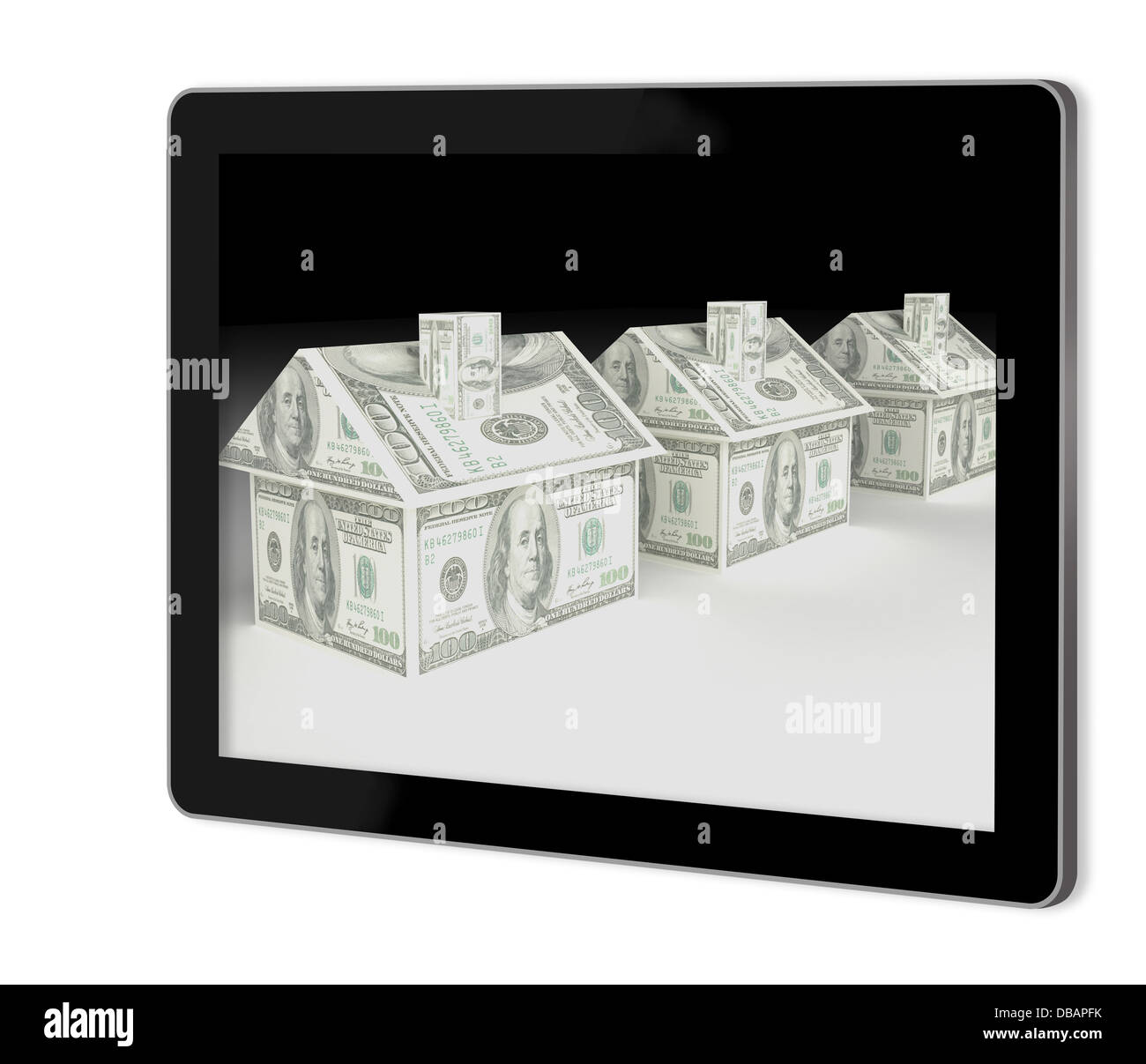 Real Estate Finance house made from dollars on screen of tablet made ...