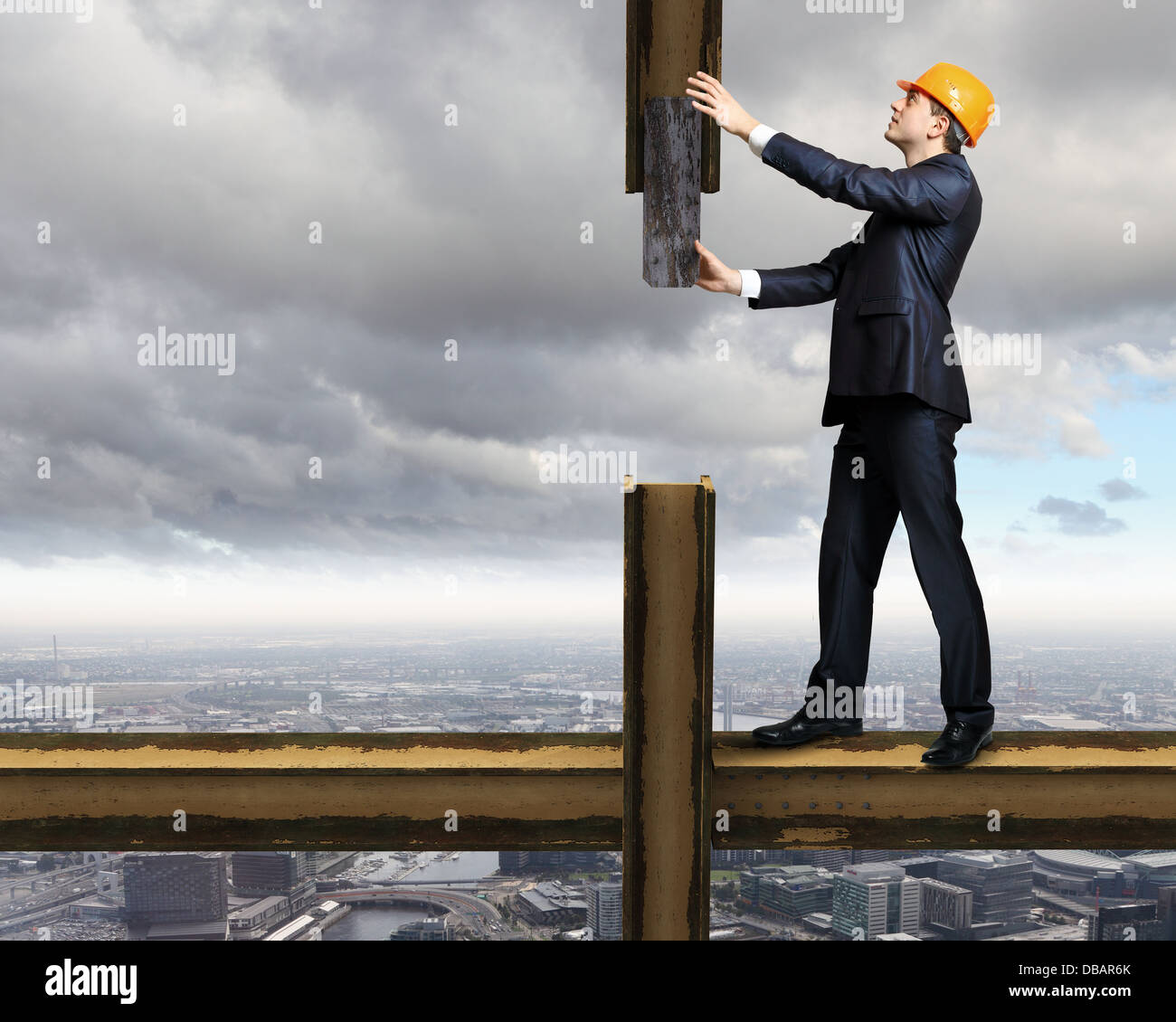 Businessman standing on the construction site Stock Photo - Alamy