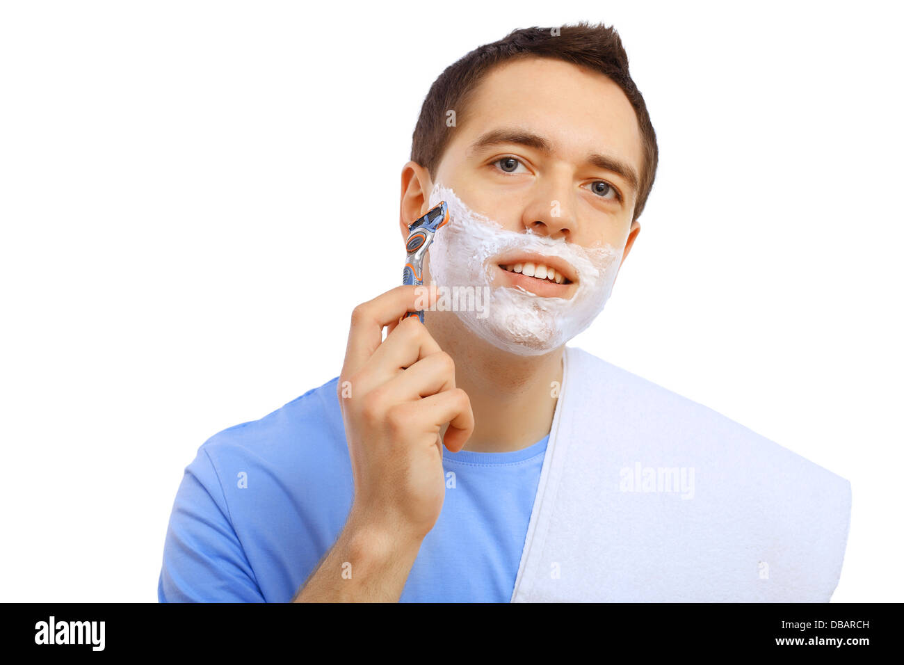 Young man shaving Stock Photo - Alamy