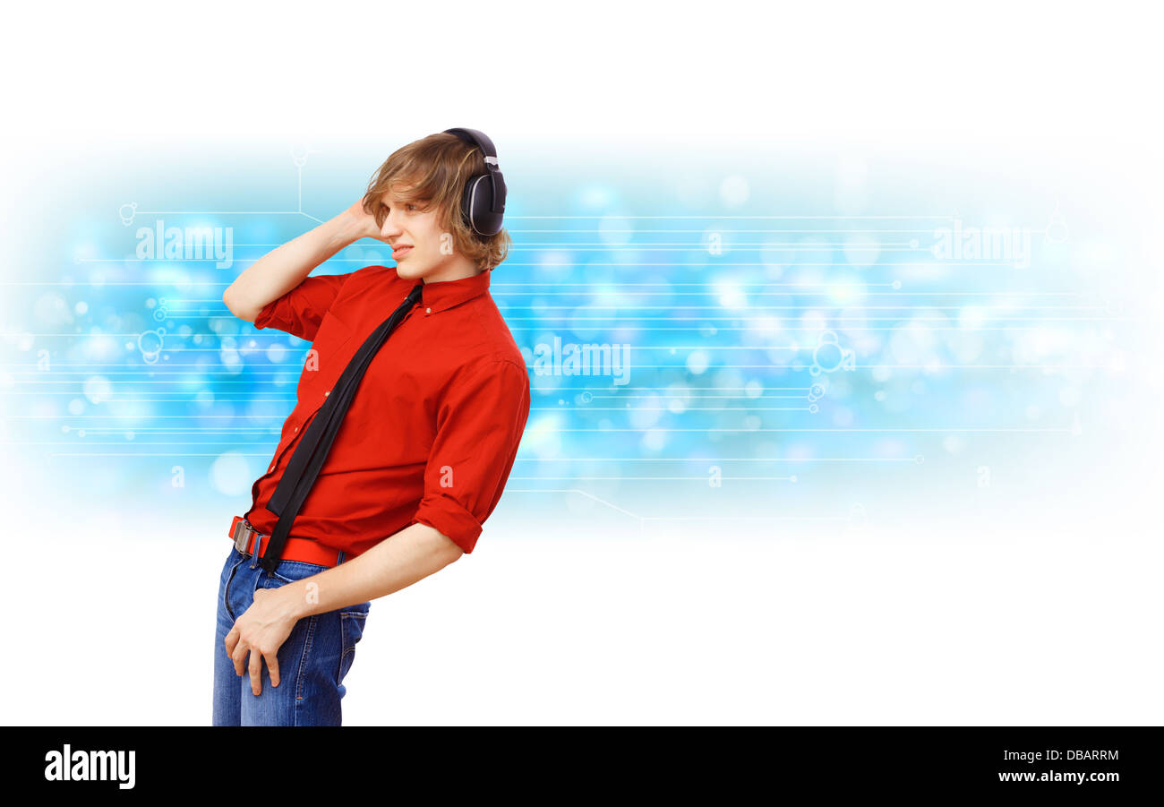 Happy smiling young man dancing Stock Photo - Alamy