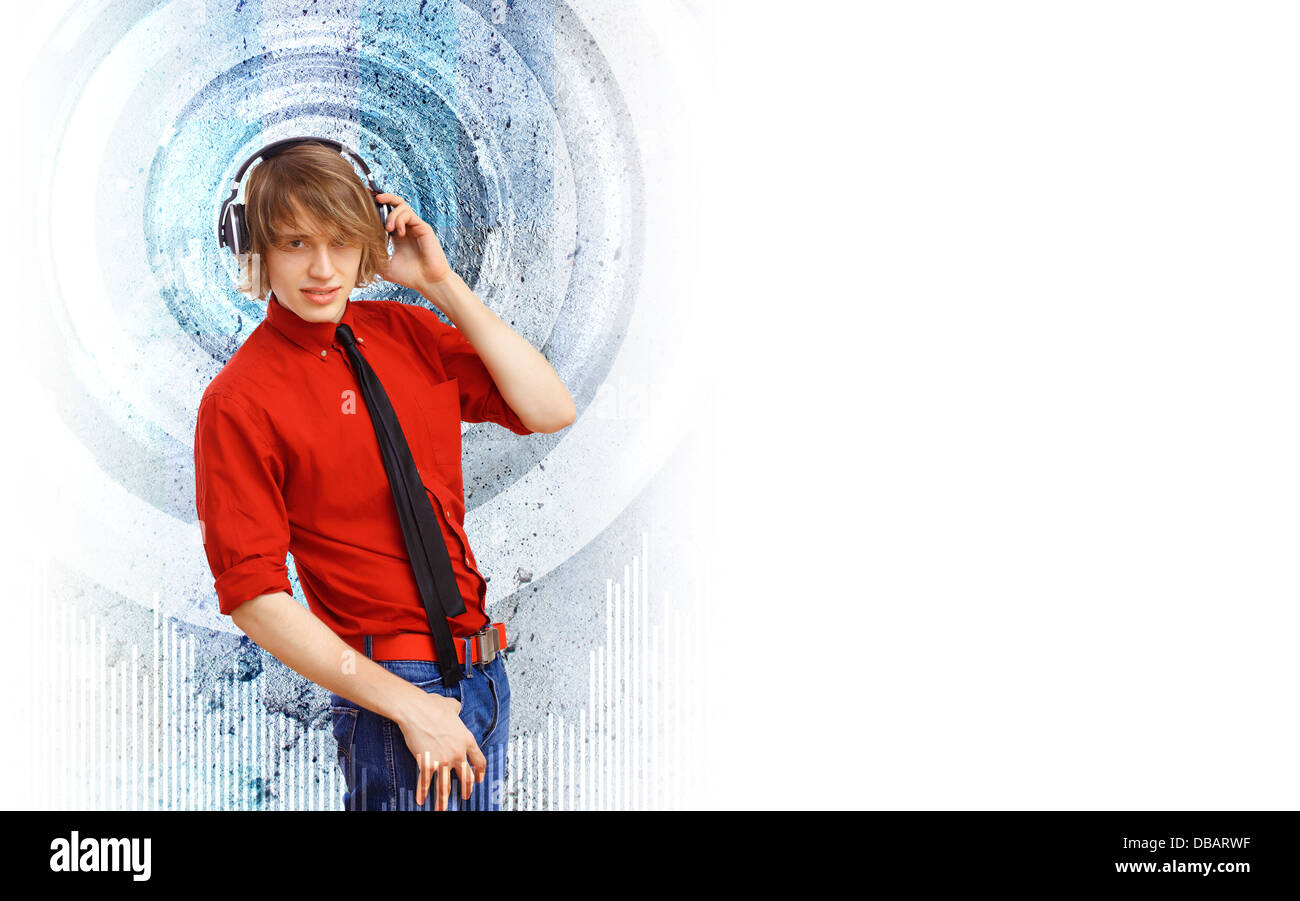 Happy smiling young man dancing Stock Photo - Alamy