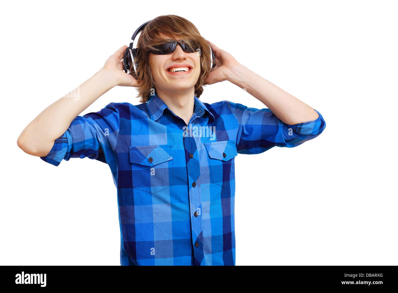 Happy smiling young man dancing Stock Photo - Alamy