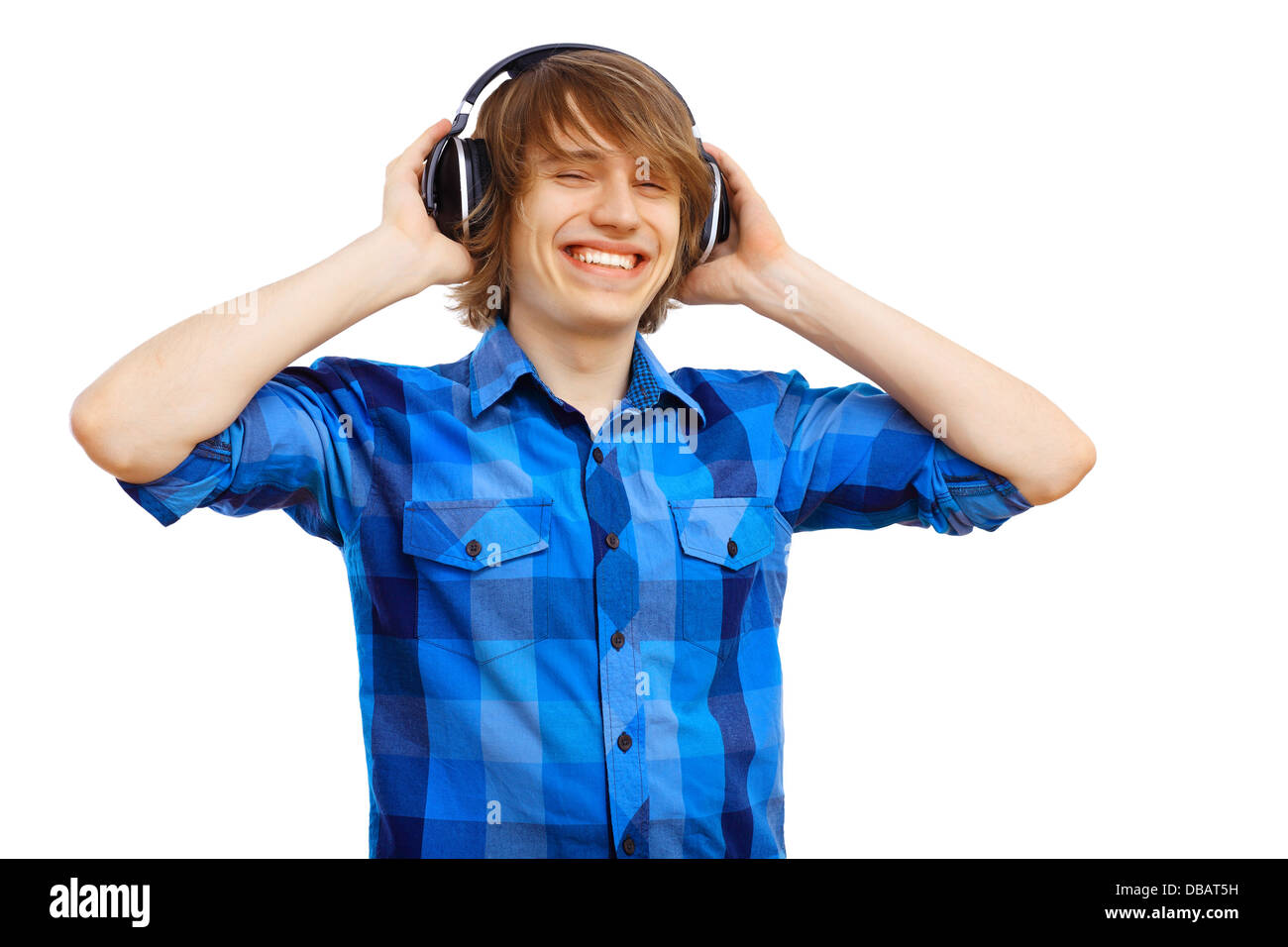 Happy smiling young man dancing Stock Photo - Alamy