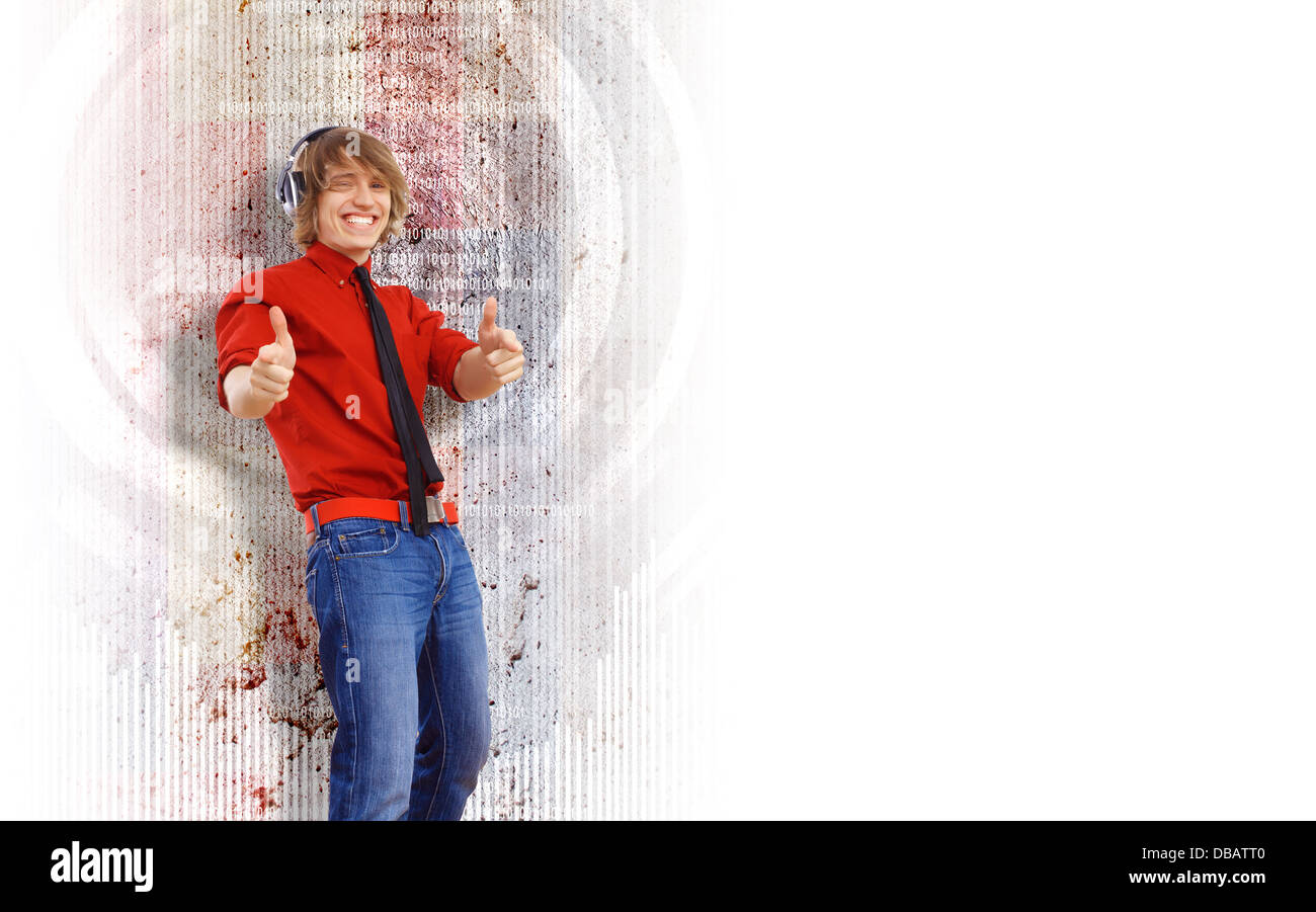 Happy smiling young man dancing Stock Photo - Alamy