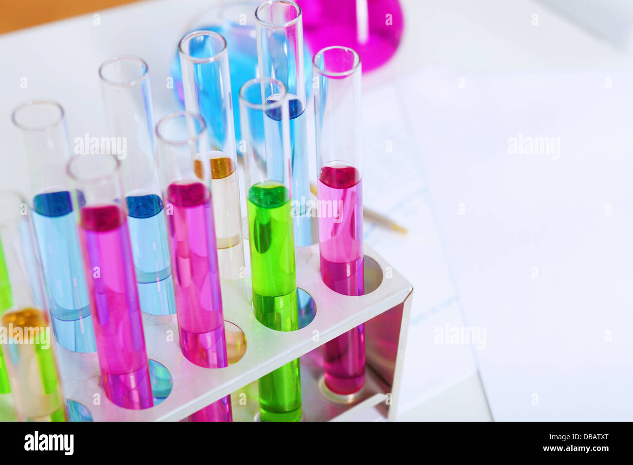Chemistry laboratory glassware with colour liquids Stock Photo - Alamy