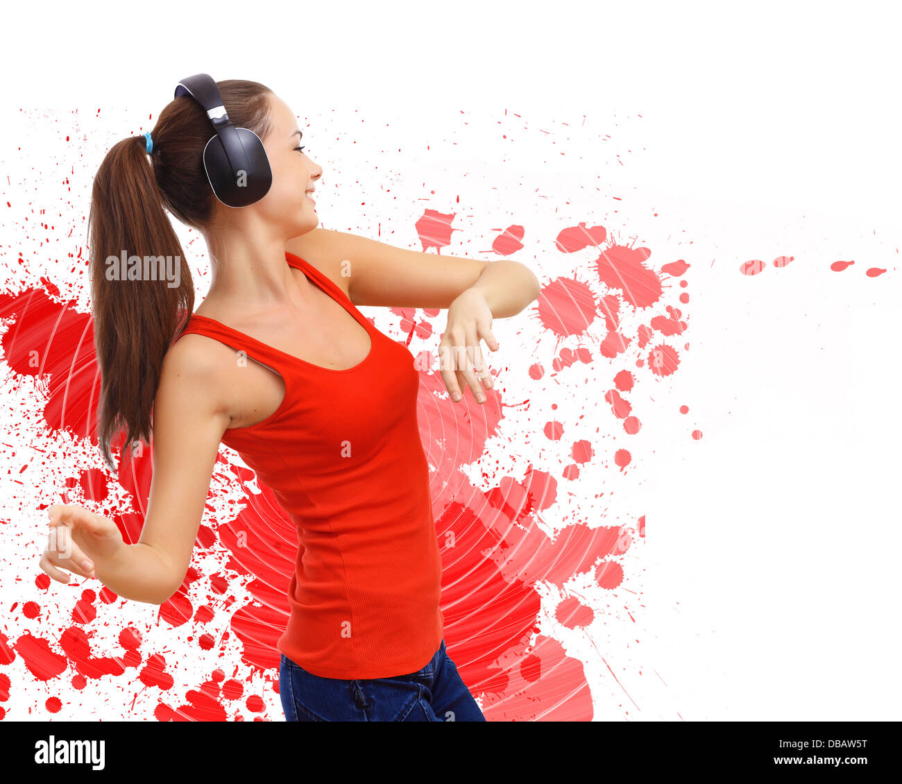 Happy smiling girl dancing Stock Photo - Alamy