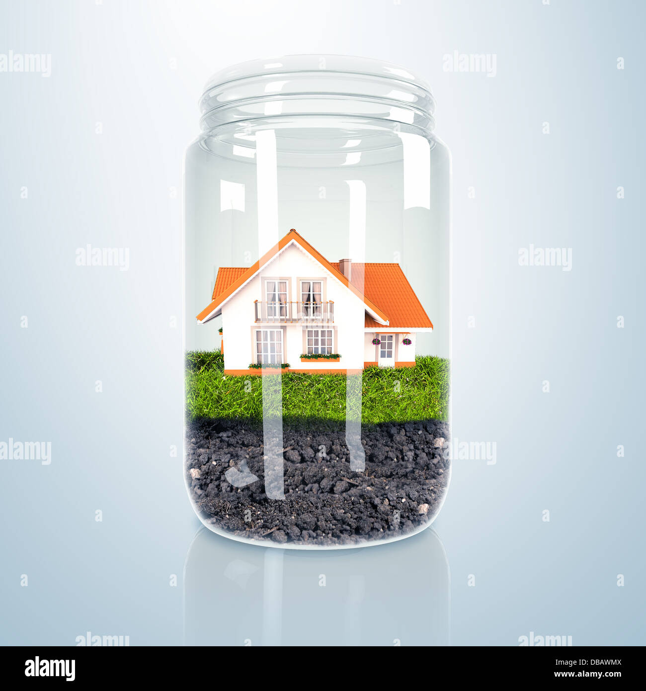 House inside glass jar Stock Photo - Alamy