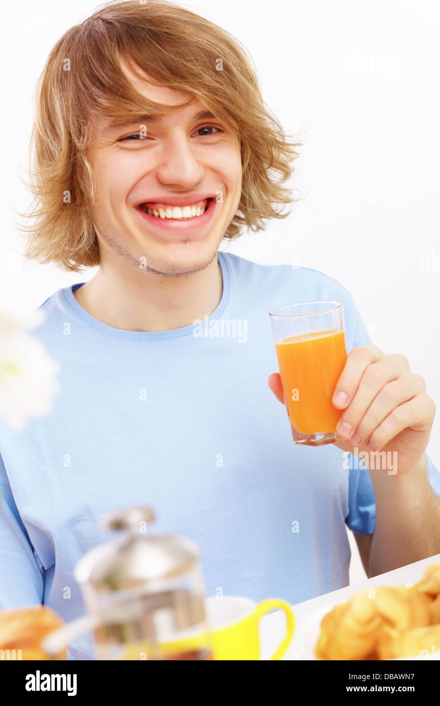 Young happy man drinking tea Stock Photo - Alamy Young happy man drinking tea Stock Photo - Alamy