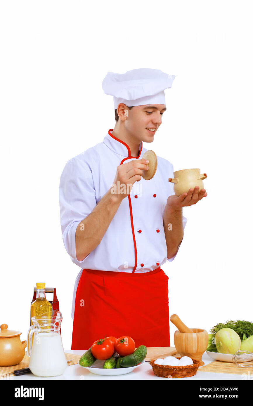 Young cook preparing food Stock Photo - Alamy