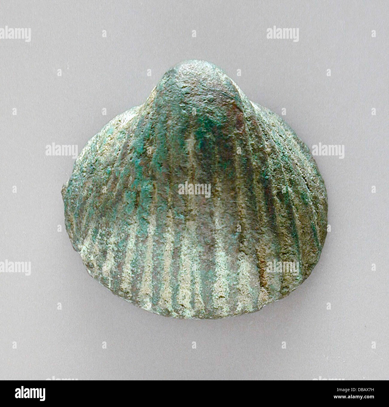 This shell figurine is a detailed bronze cast artifact, part of the ...