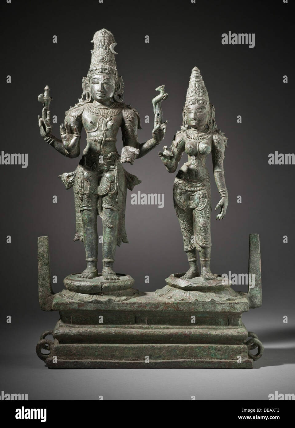 This bronze sculpture depicts the Hindu deities Shiva and Parvati ...