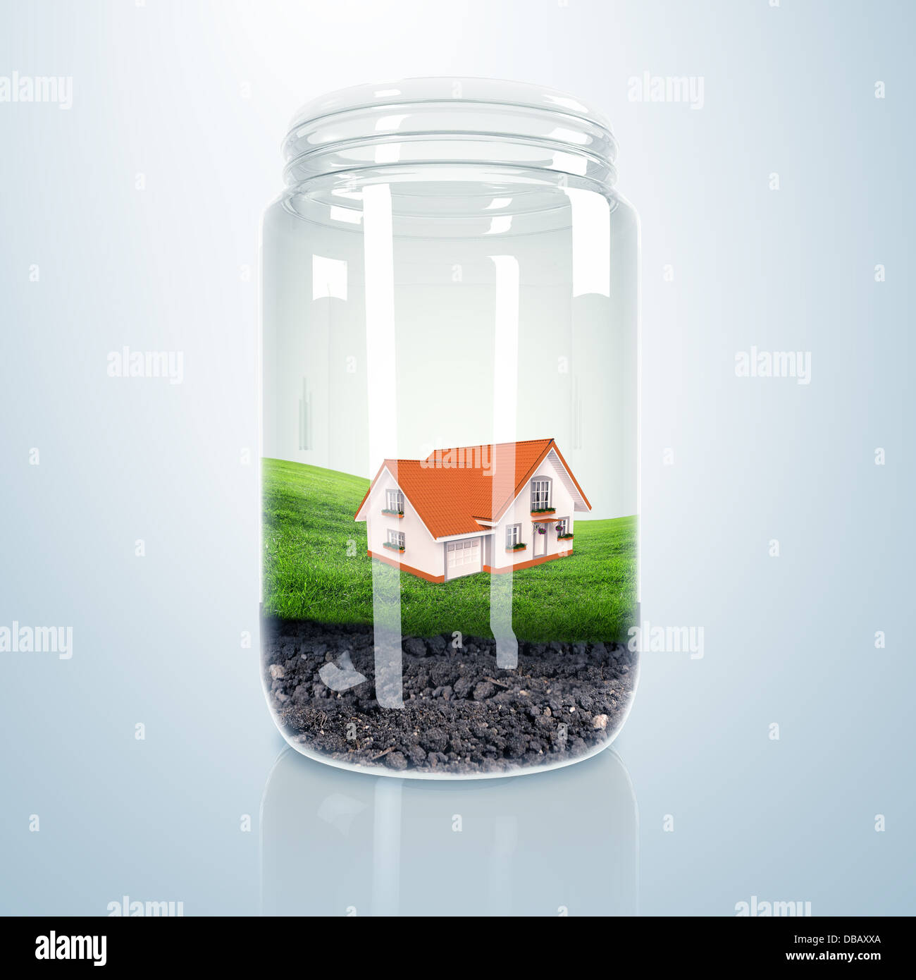 House inside glass jar Stock Photo - Alamy