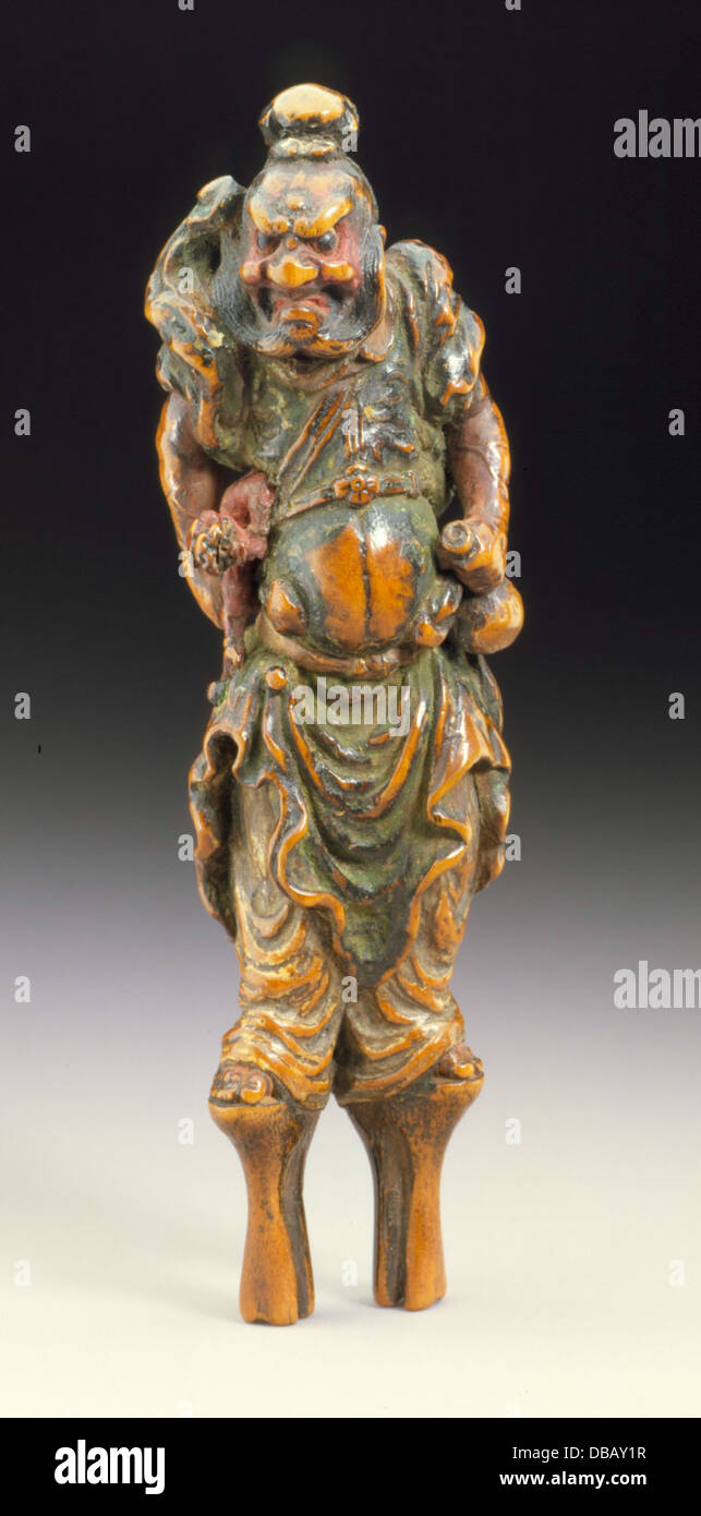 This Japanese bronze sculpture depicts Shoki, the Demon Queller, in ...