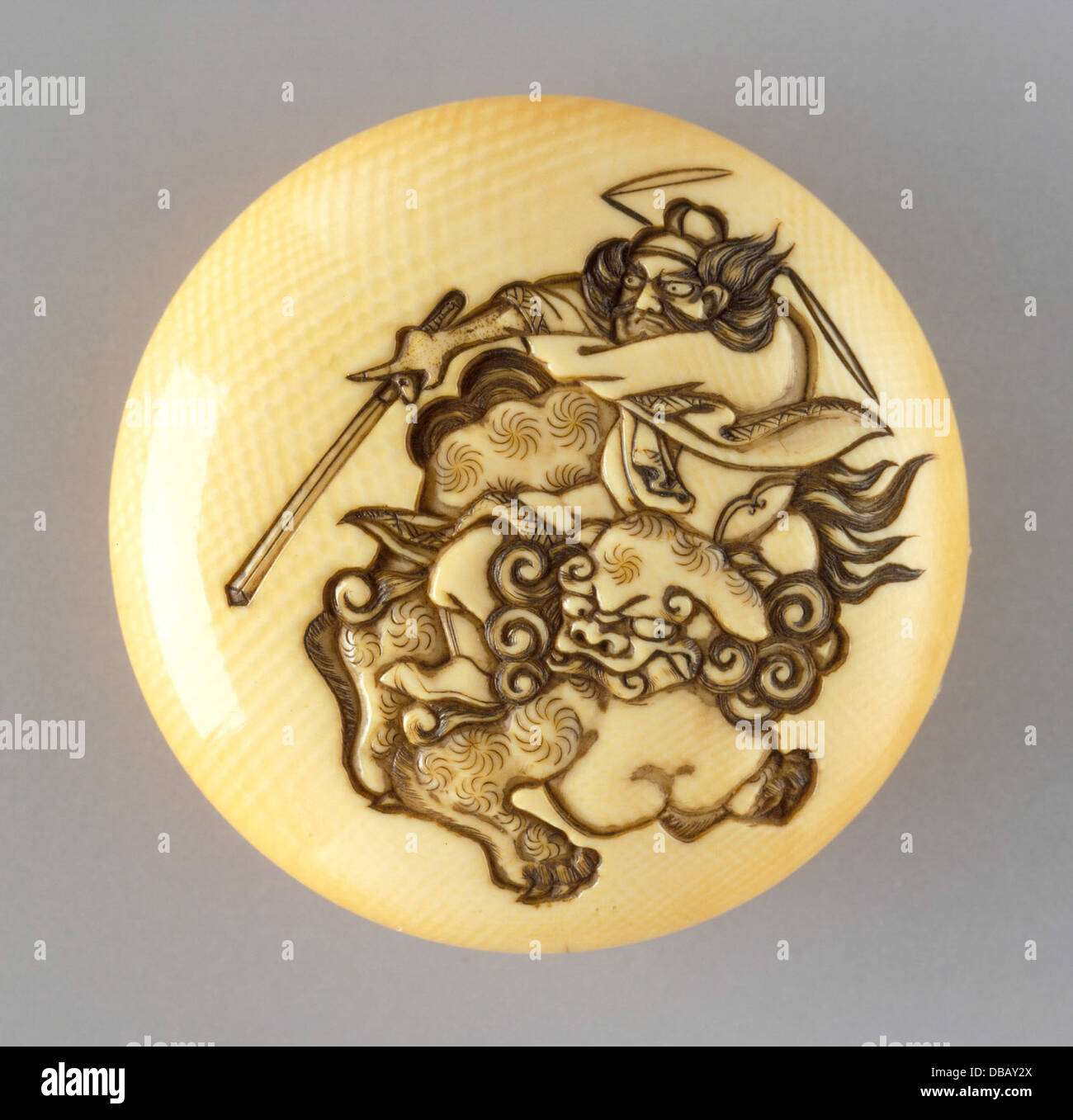 This Chinese artwork features Shoki, a legendary figure, mounted on a ...