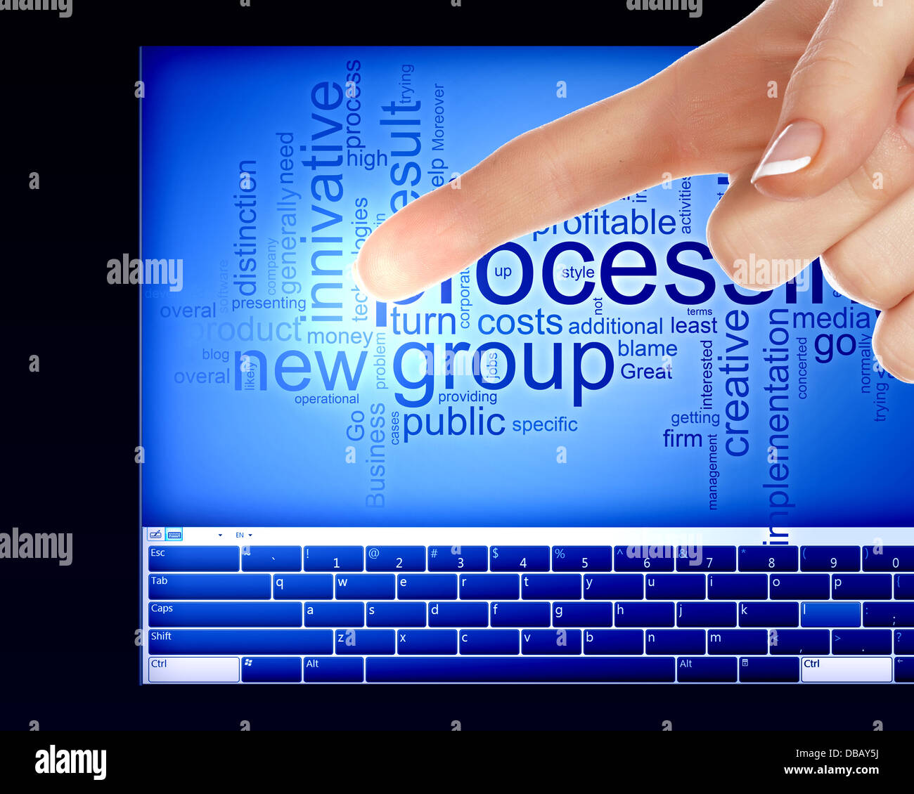 Finger touching a blue computer screen Stock Photo - Alamy