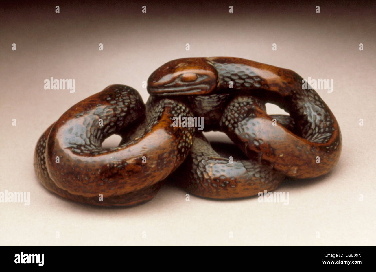 A bronze sculpture of a snake, part of the archaeological collection of ...