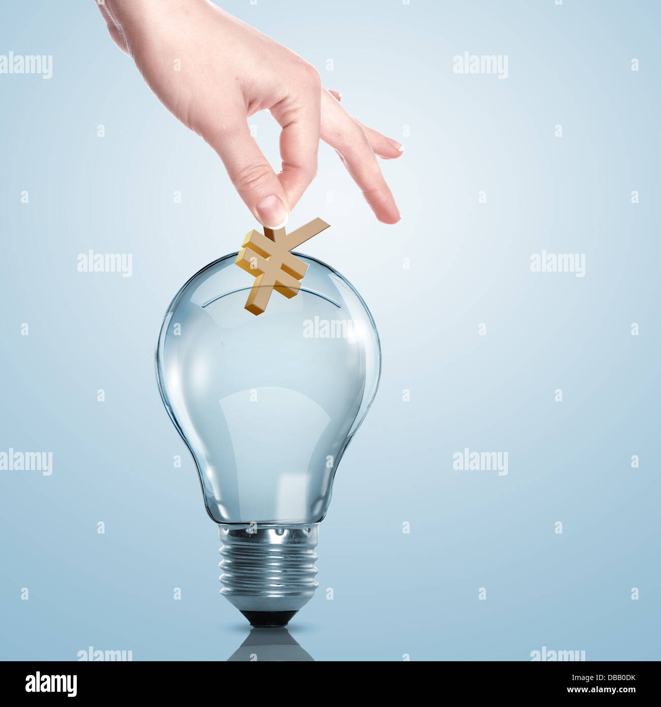 Money inside an electric light bulb Stock Photo - Alamy