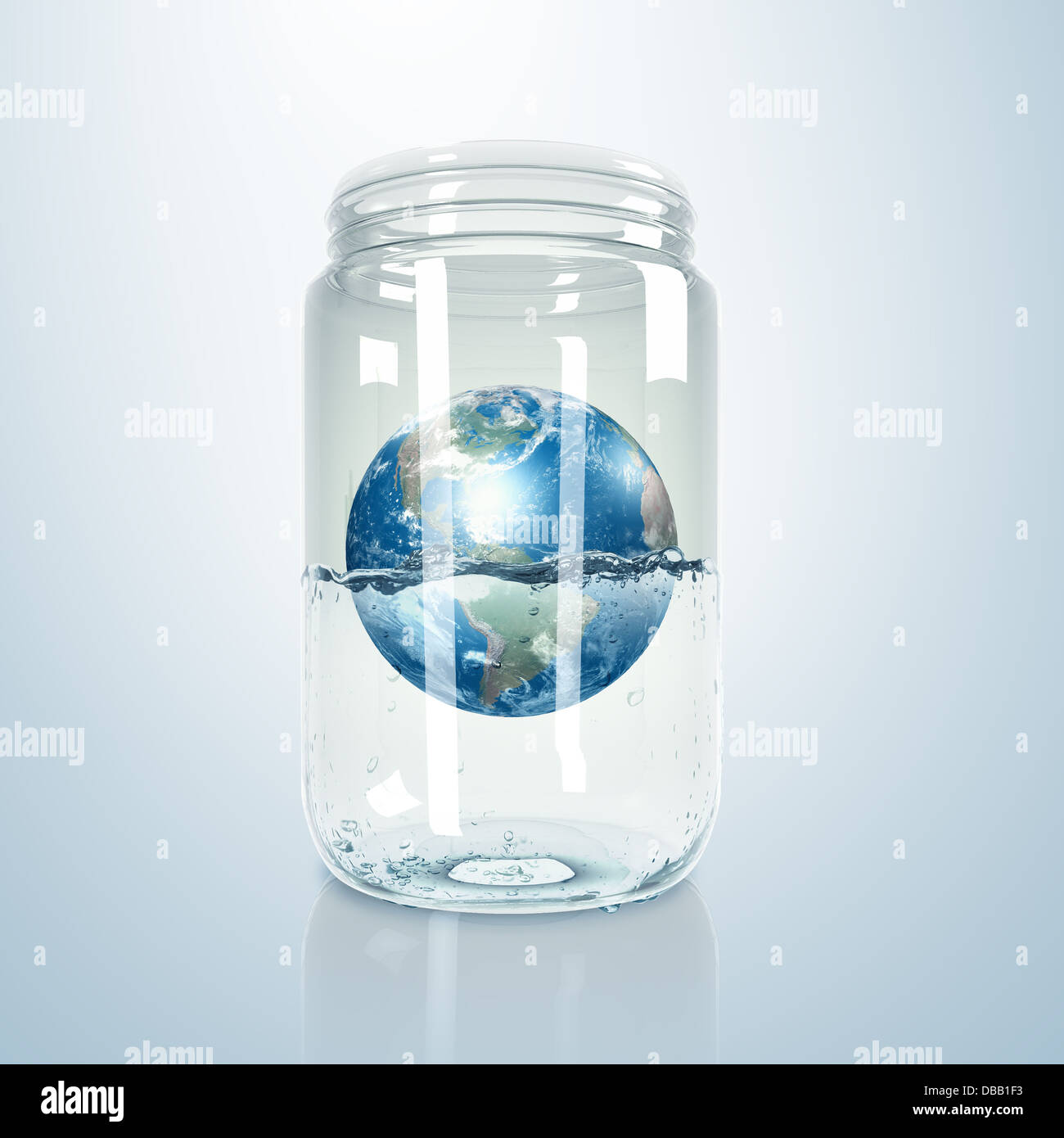 Planet earth inside glass jar Stock Photo - Alamy