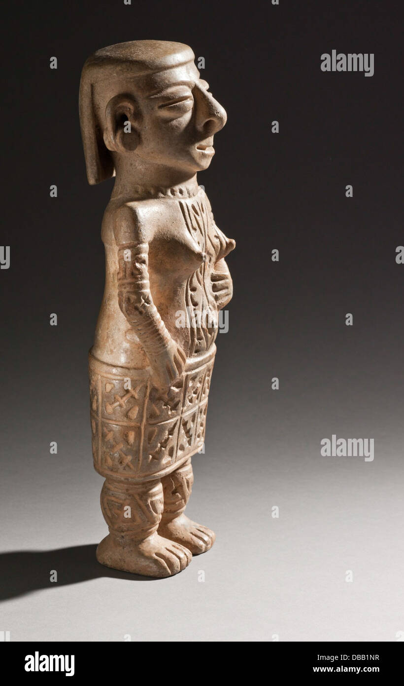 A standing female figure sculpture featuring earspools, part of the ...