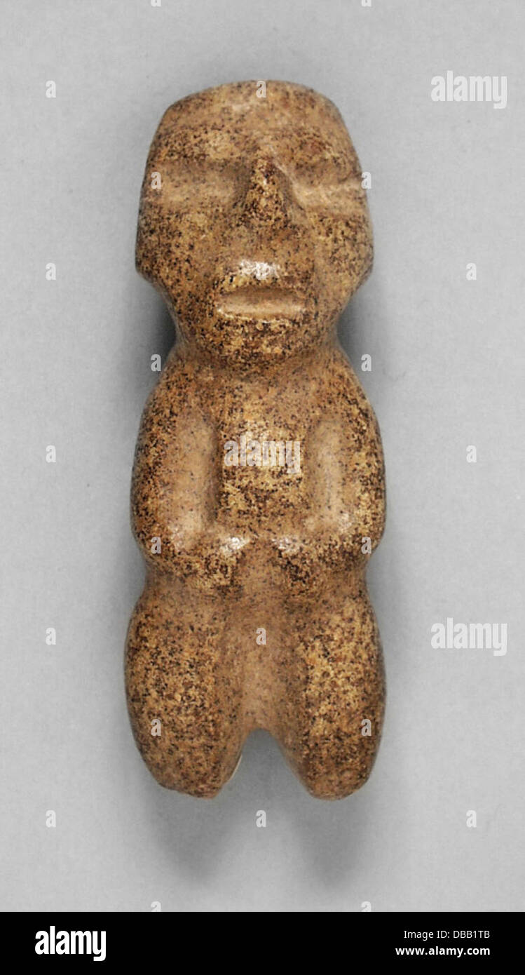 This sculpture depicts a standing human figure, showcasing traditional ...