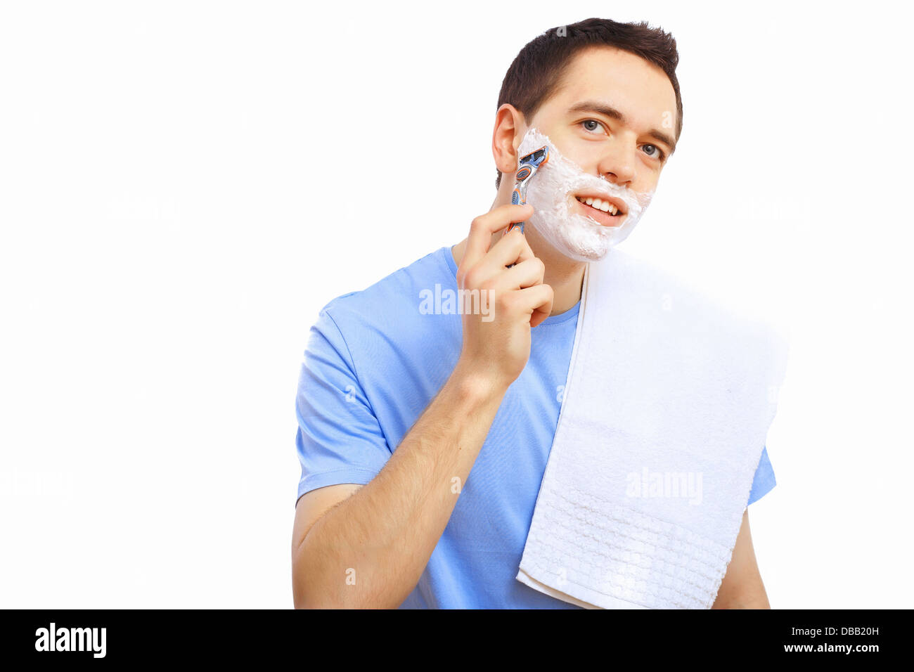 Young man at home shaving himself Stock Photo - Alamy
