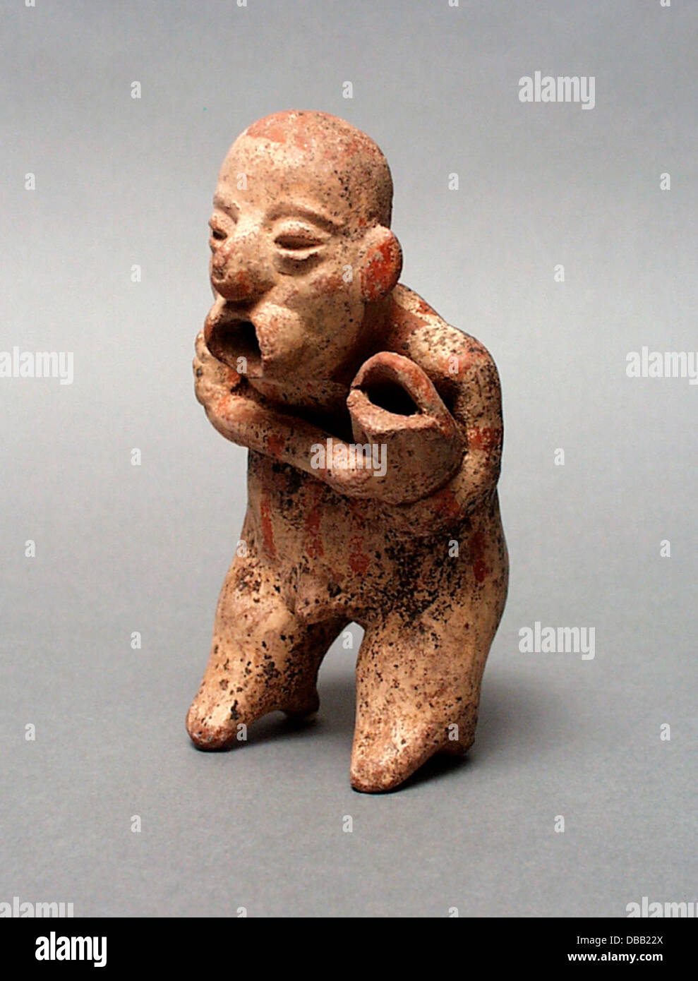 This bronze sculpture represents a male figure, featuring intricate ...