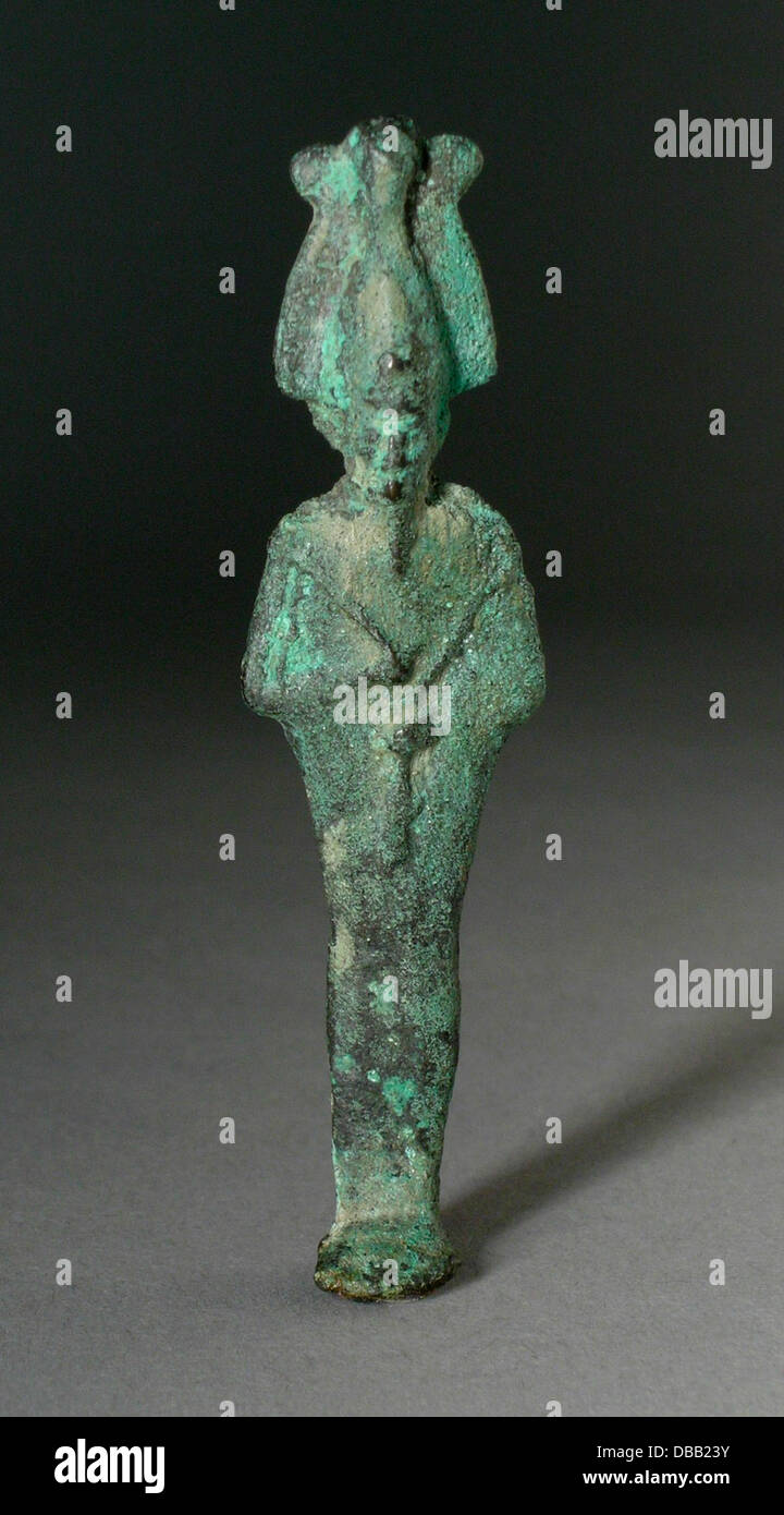 A standing figure of Osiris, the Egyptian god of the afterlife, carved ...