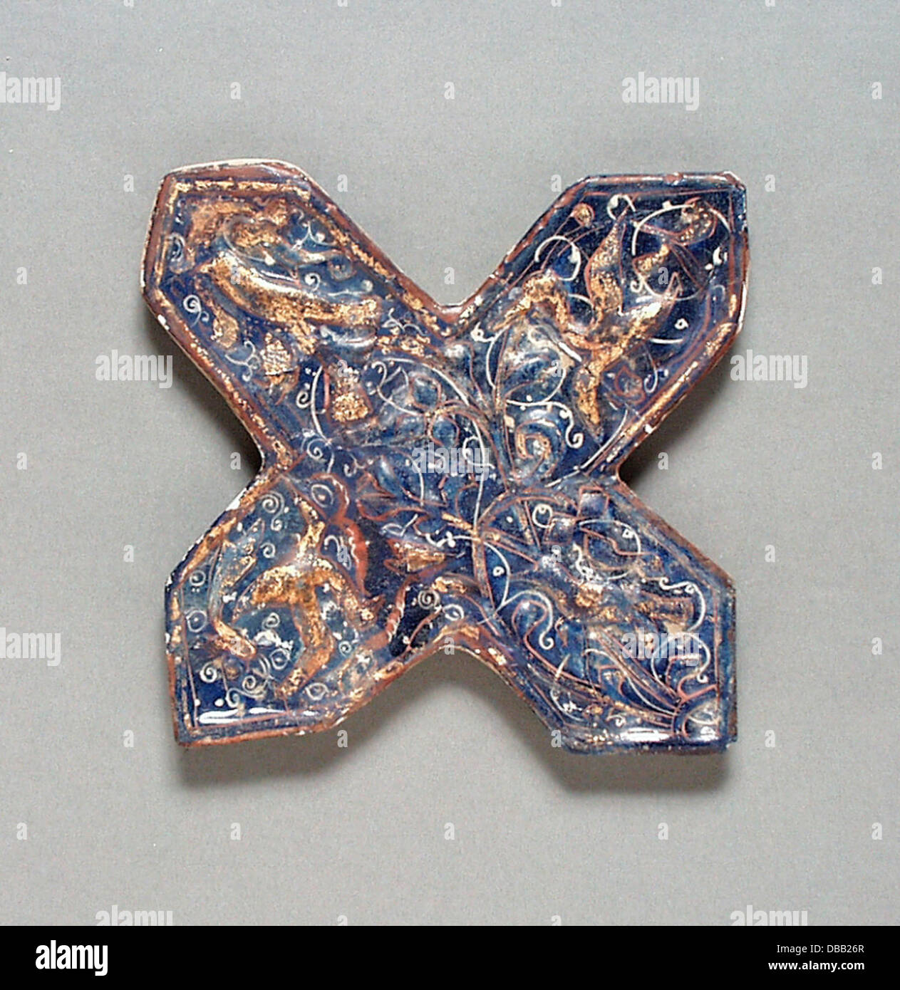 A set of tiles featuring star and cross patterns, illustrating the use ...