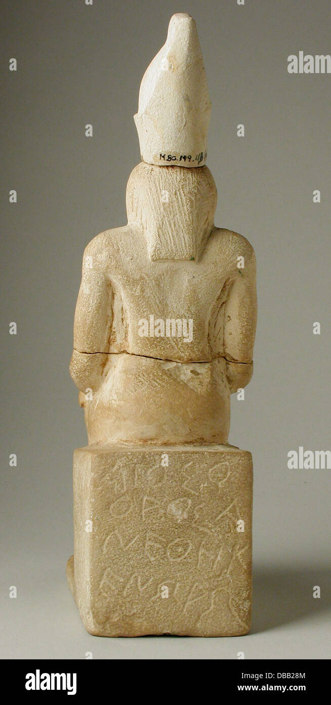 This seated statue of Horus, an ancient Egyptian deity, is a finely ...