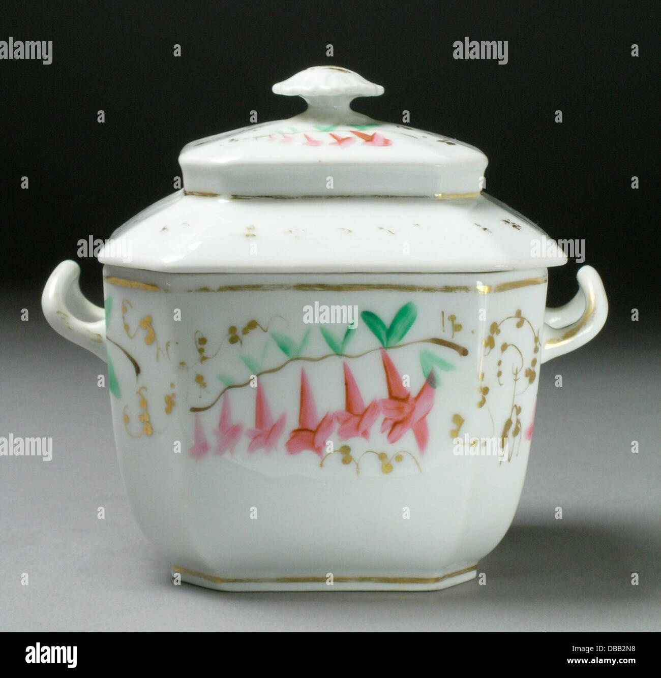 This sugarbox, crafted from fine materials, likely served both a ...