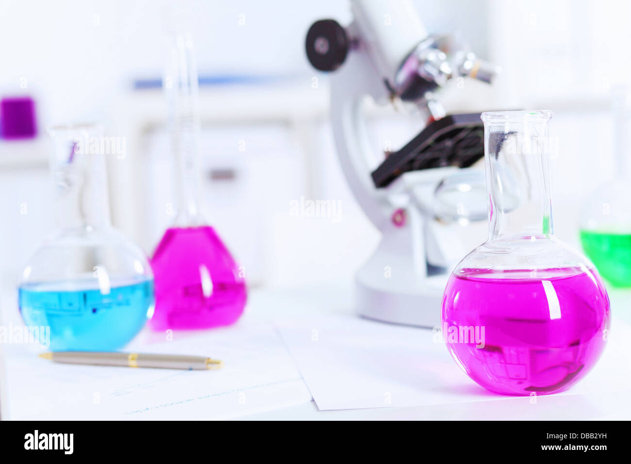 Chemistry laboratory glassware with colour liquids Stock Photo - Alamy