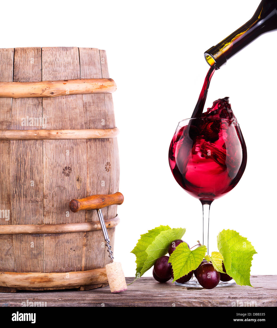 Red wine, glass barrel with grapes over white Stock Photo - Alamy