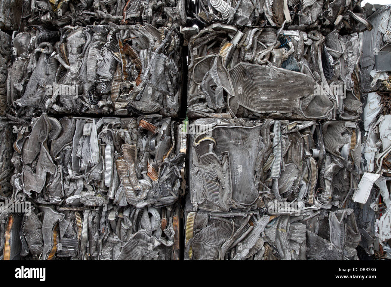 Closeup of scrap metal bales bundled for recycling Stock Photo - Alamy